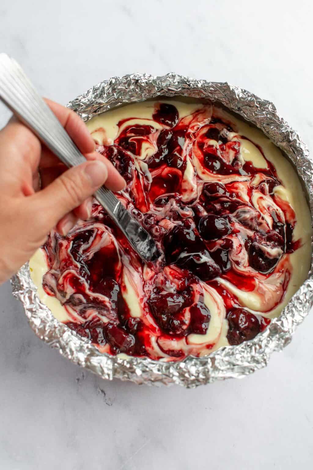Baked Cherry Cheesecake with a Homemade Cherry Sauce Swirl - Humbly ...